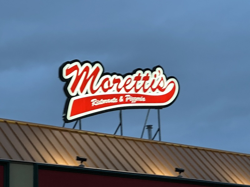 Enjoying some deep dish pizza at Moretti’s in Chicago